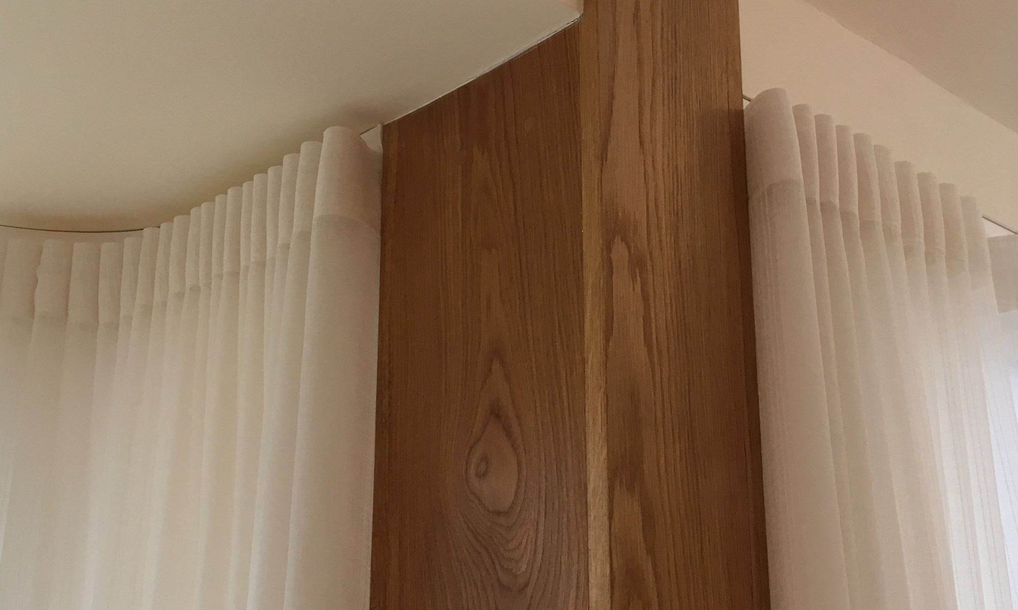 Floor to ceiling linen effect voiles with a wave heading – Willow & Bee